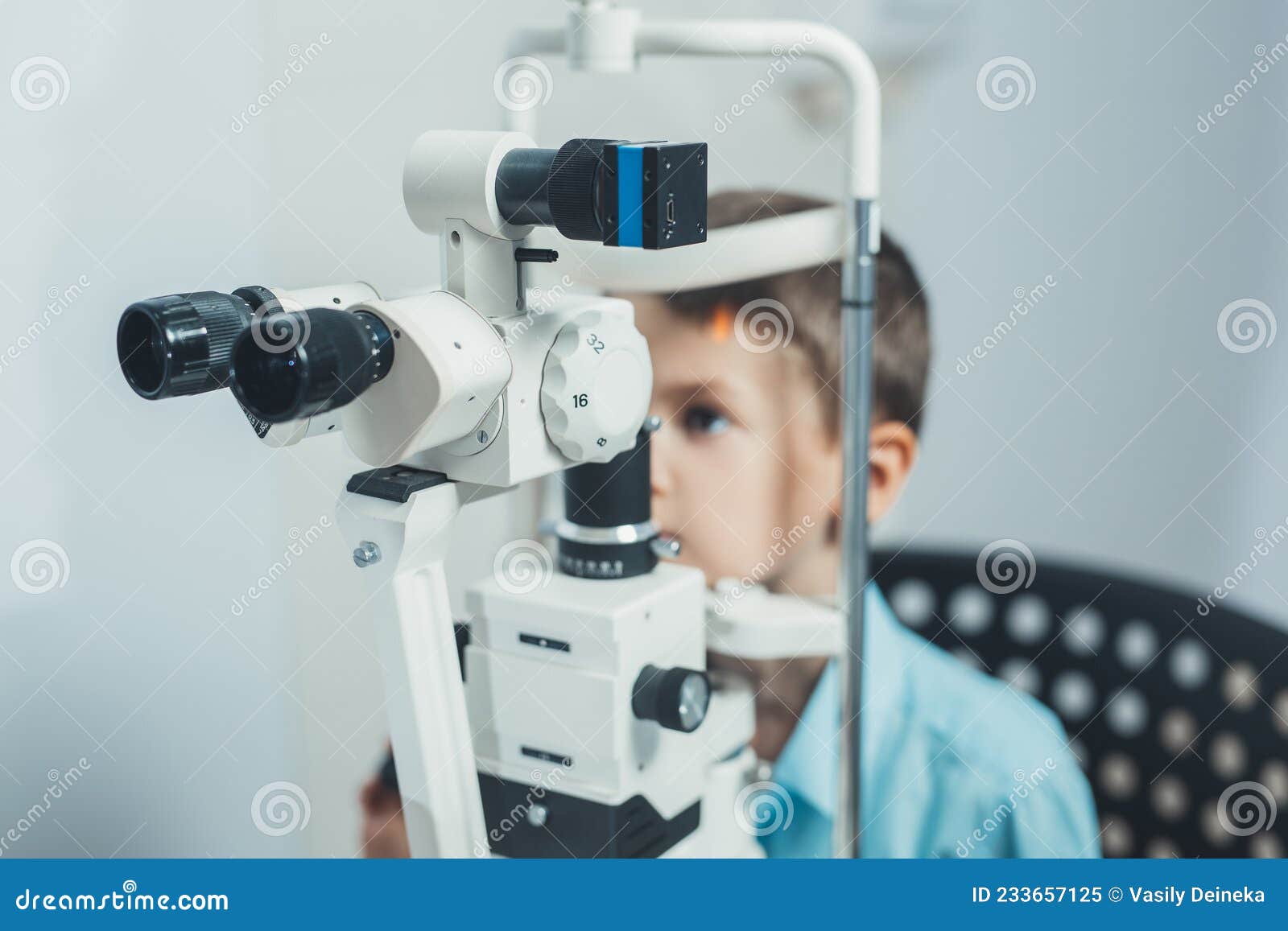 Ophthalmologist Checks the Boy`s Vision. Hyperopia. Vision Tests in ...