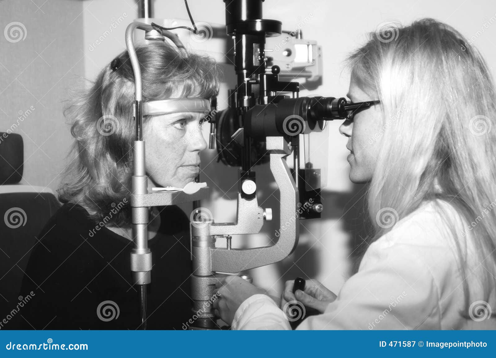 Ophthalmologist Conducting an Eye Examination Stock Image - Image of ...