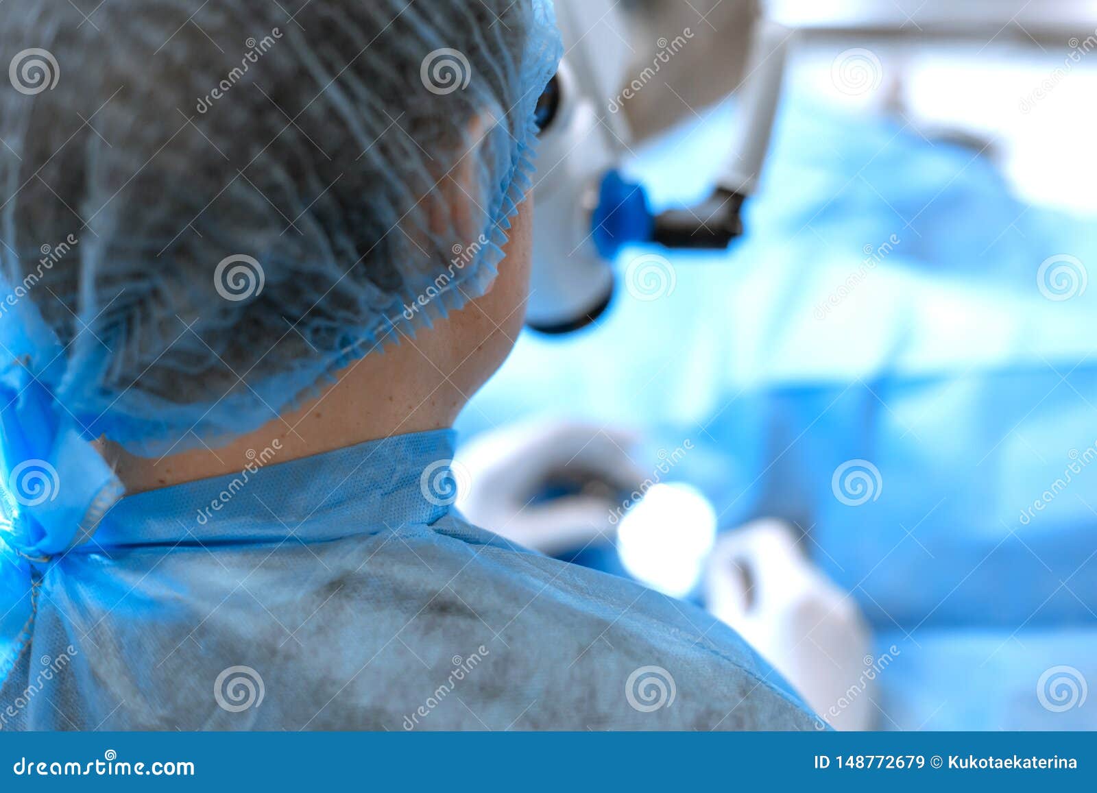 Ophthalmologist Surgeon Looking through Surgical Microscope Doing ...