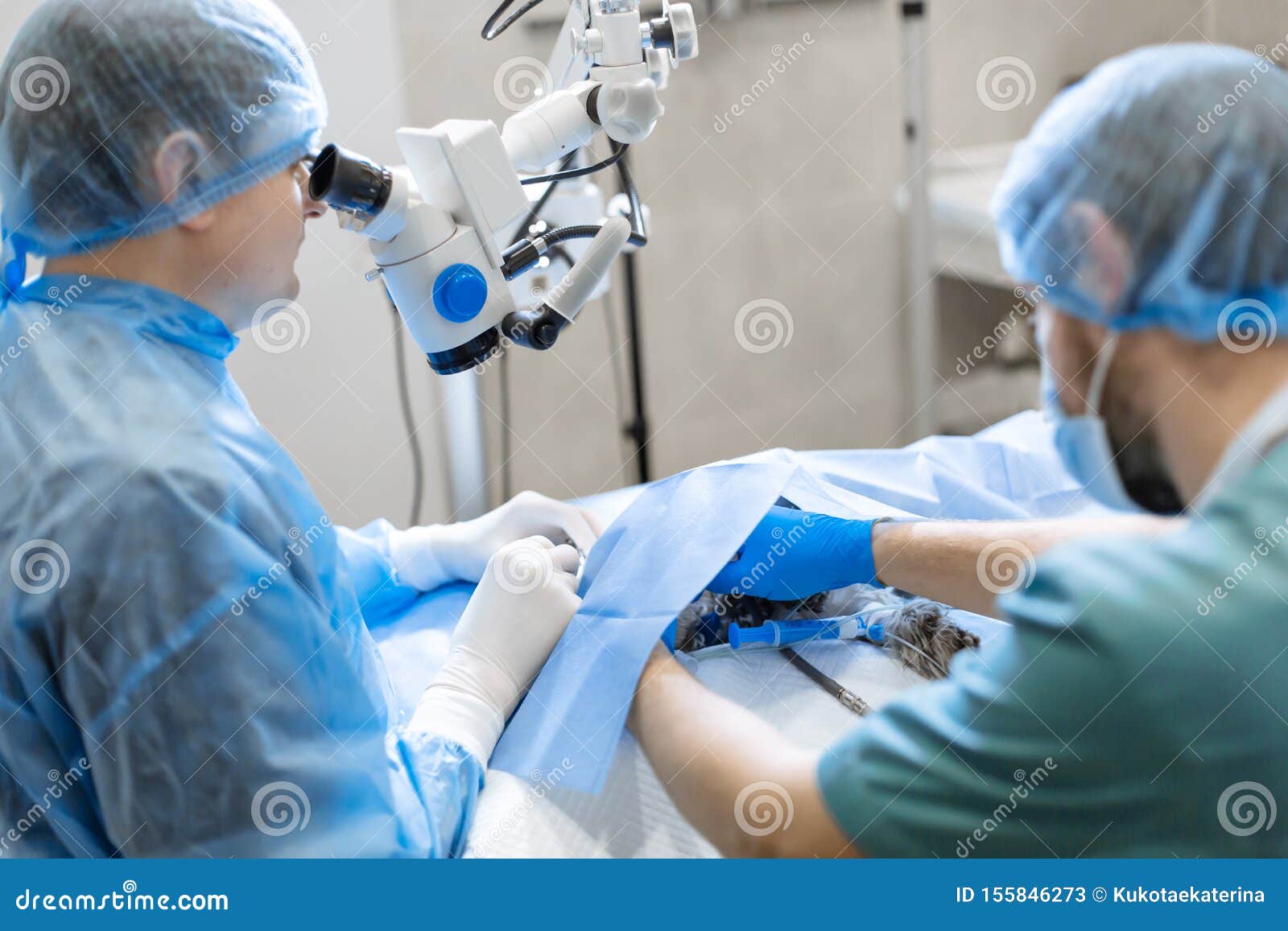 Ophthalmologist Surgeon Looking through Surgical Microscope Doing ...