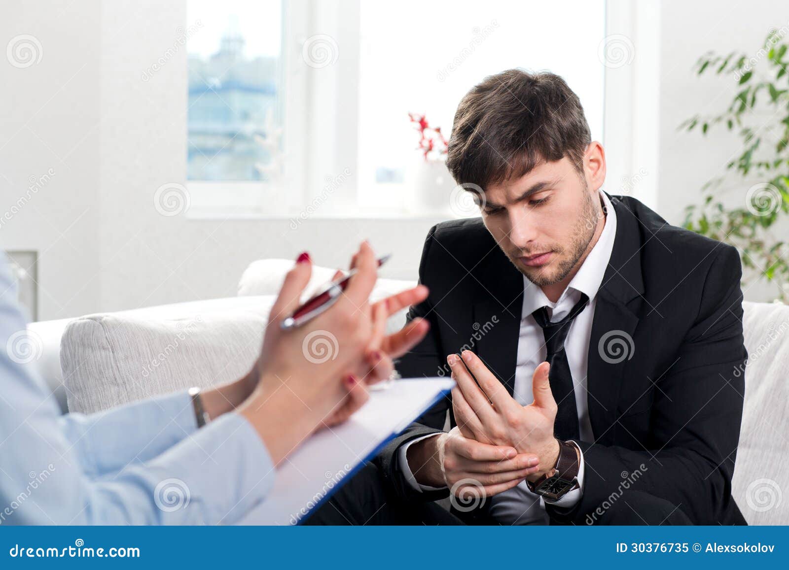 Oppressed Man Talking with Psychologist Stock Image - Image of ...
