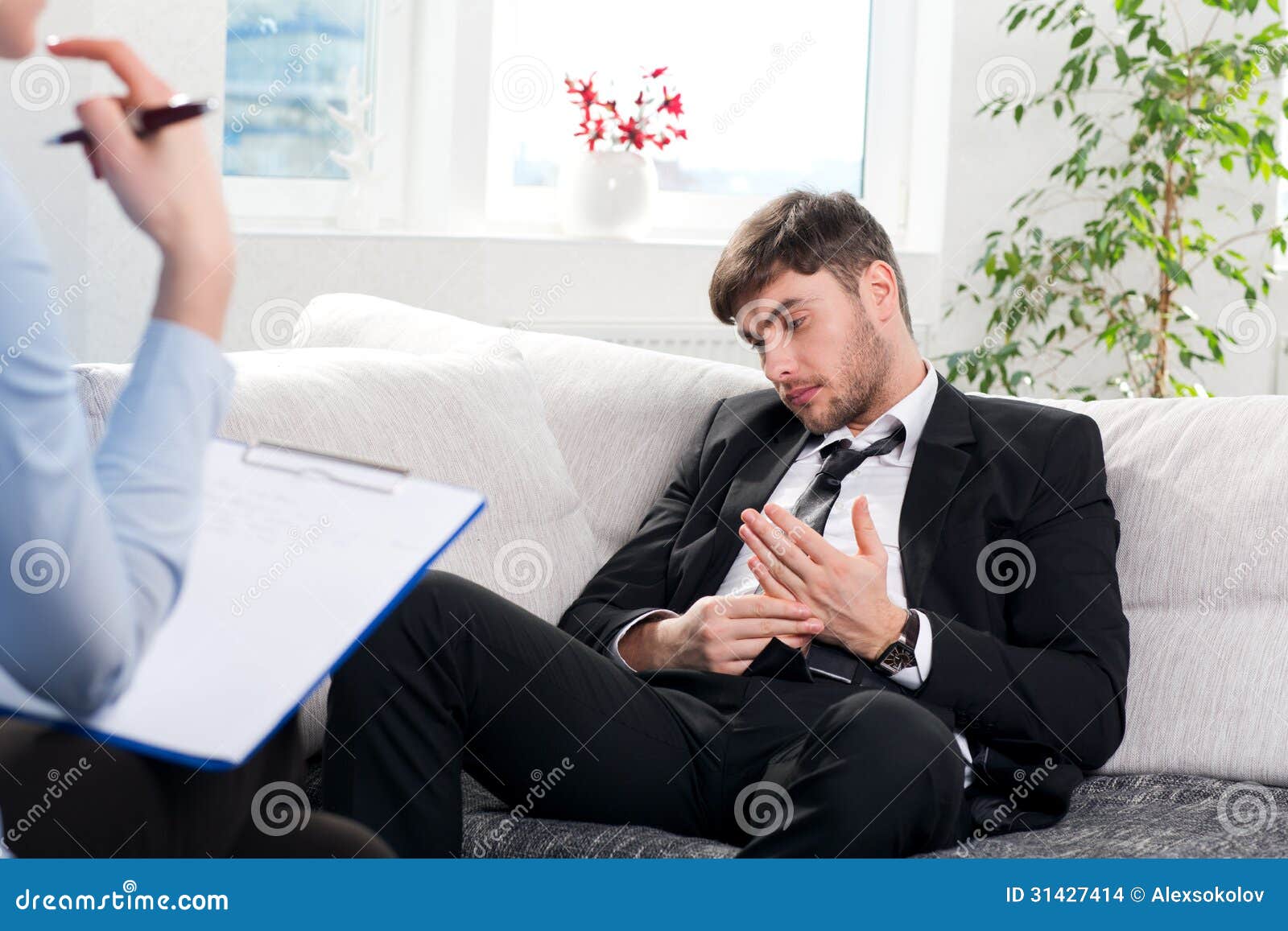 Oppressed Man Talking with Psychologist Stock Photo - Image of ...