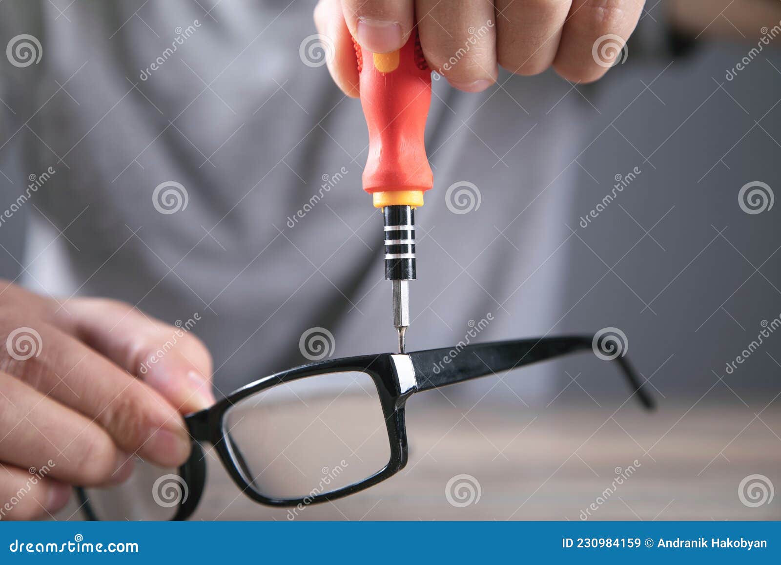 Optical Technician Repairing Eyeglasses with Screwdriver Stock Image ...