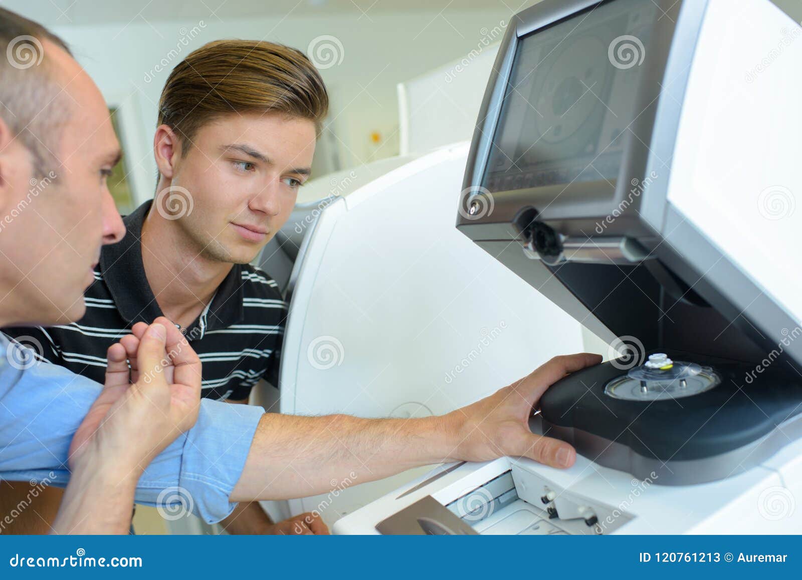 Optician and Apprentice Using Machinery Stock Image - Image of sight ...