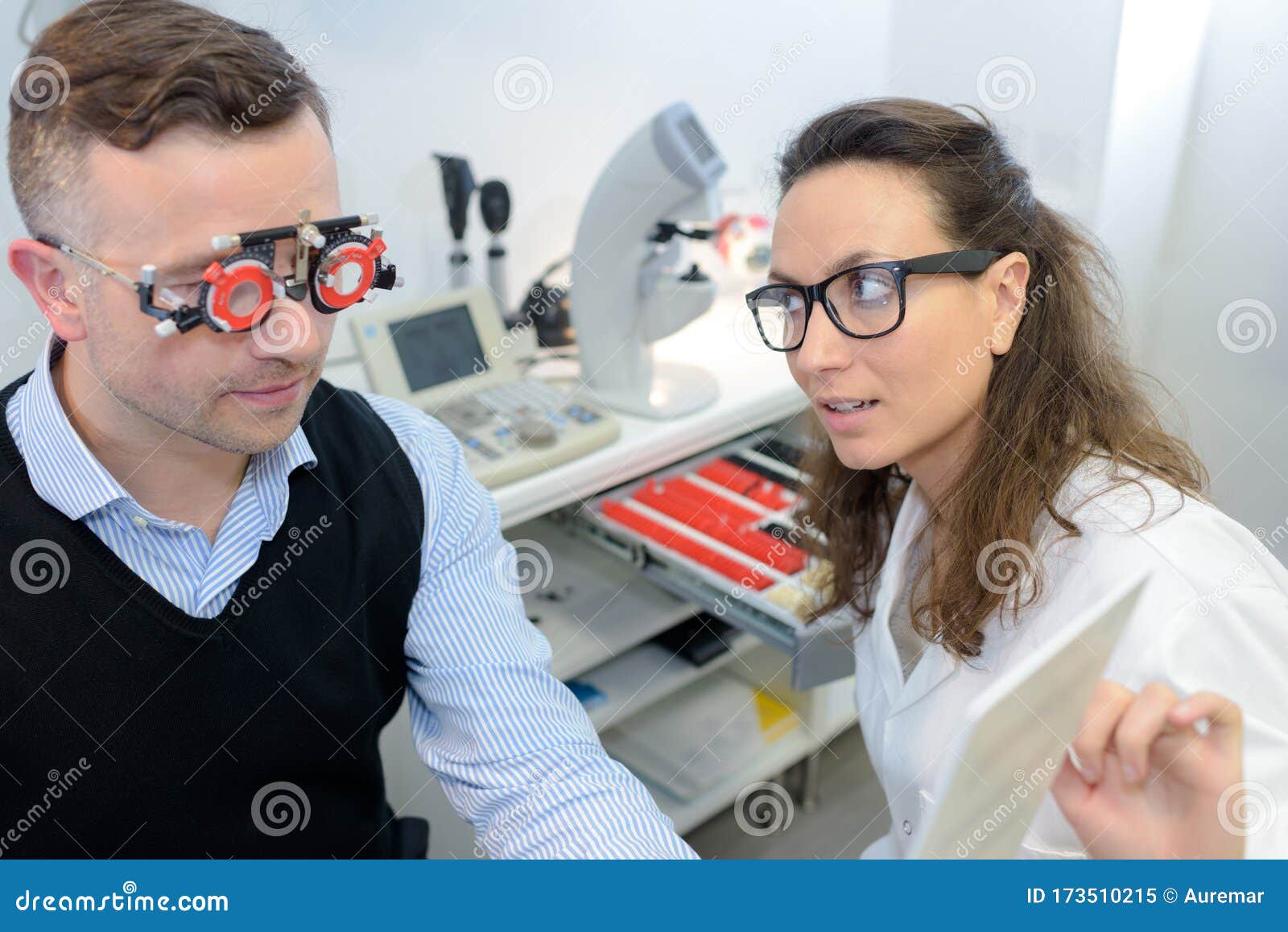 Optician Checking Female Patients Vision Stock Image - Image of ...