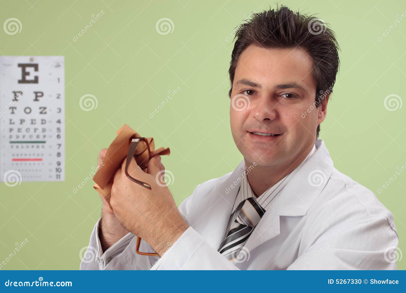 Optician Cleaning Eye Glasses Stock Photo - Image of eyecare, friendly ...