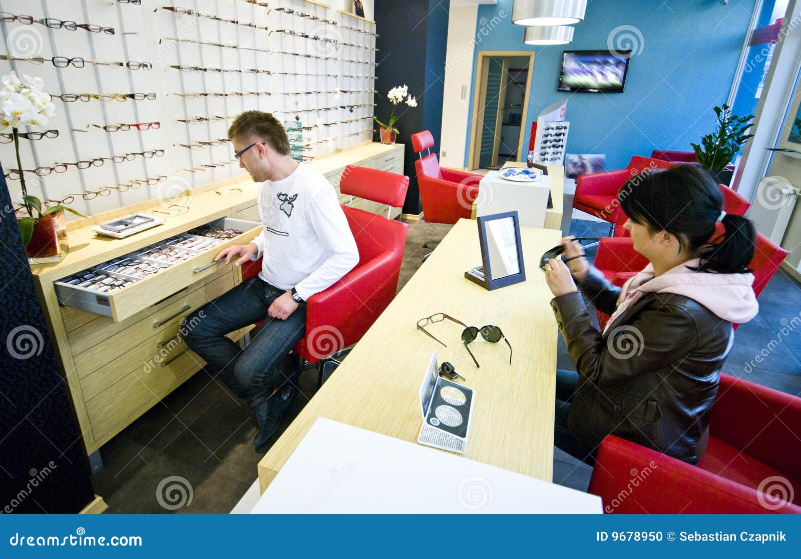 Optician and customer stock photo. Image of spectacles - 9678950