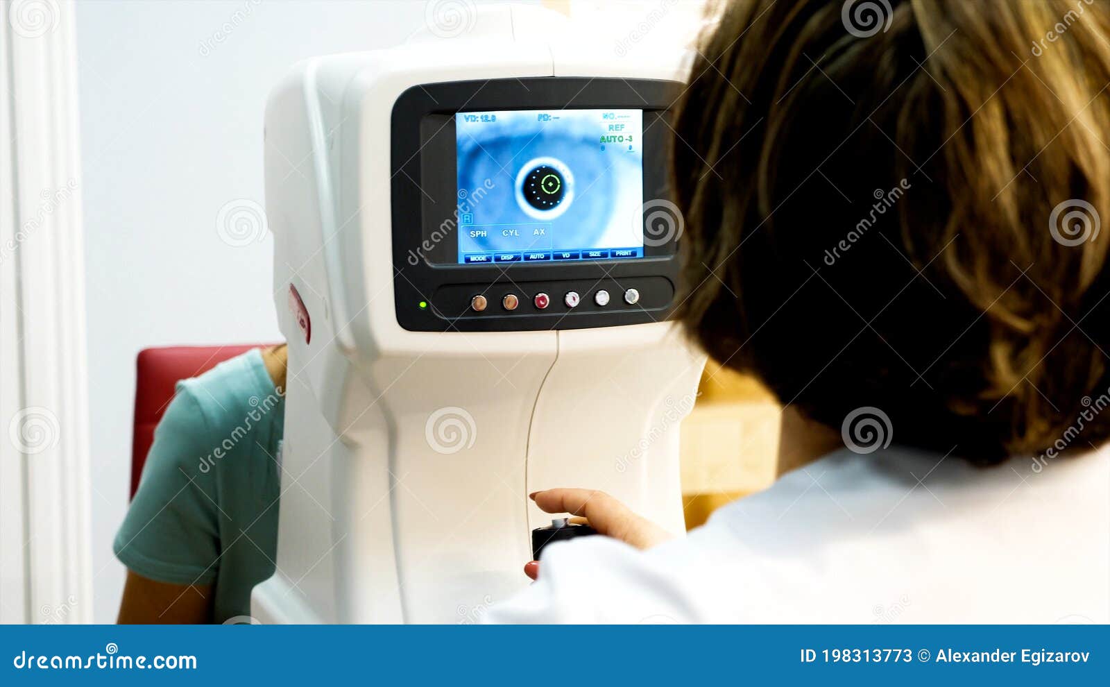 Optician Doctor Working with the Refractometer Machine. Stock Image ...