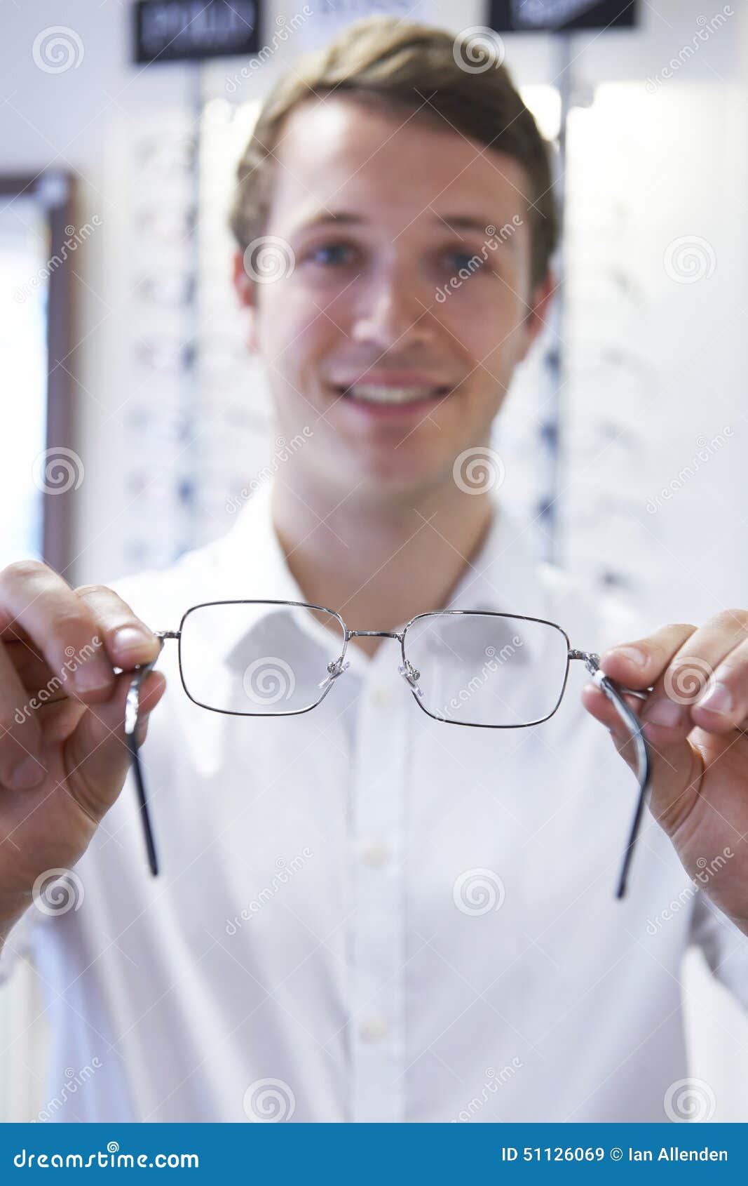 Optician Fitting New Glasses for Client Stock Image - Image of ...
