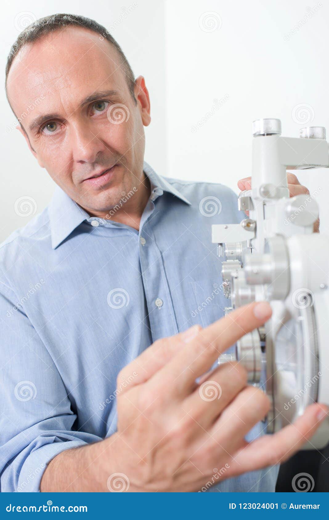 Optician Pointing To Equipment Stock Image - Image of test, sight ...