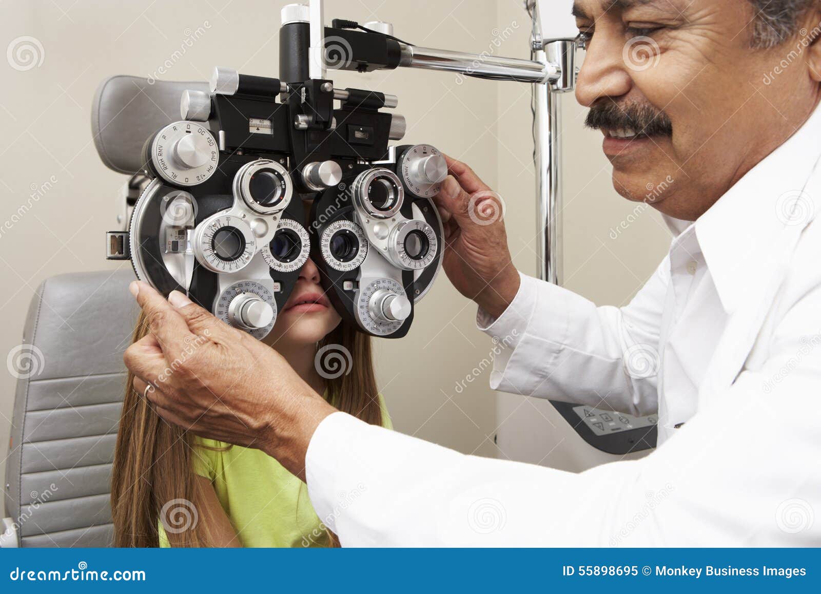 Optician in Surgery Giving Girl Eye Test Stock Image - Image of doctors ...