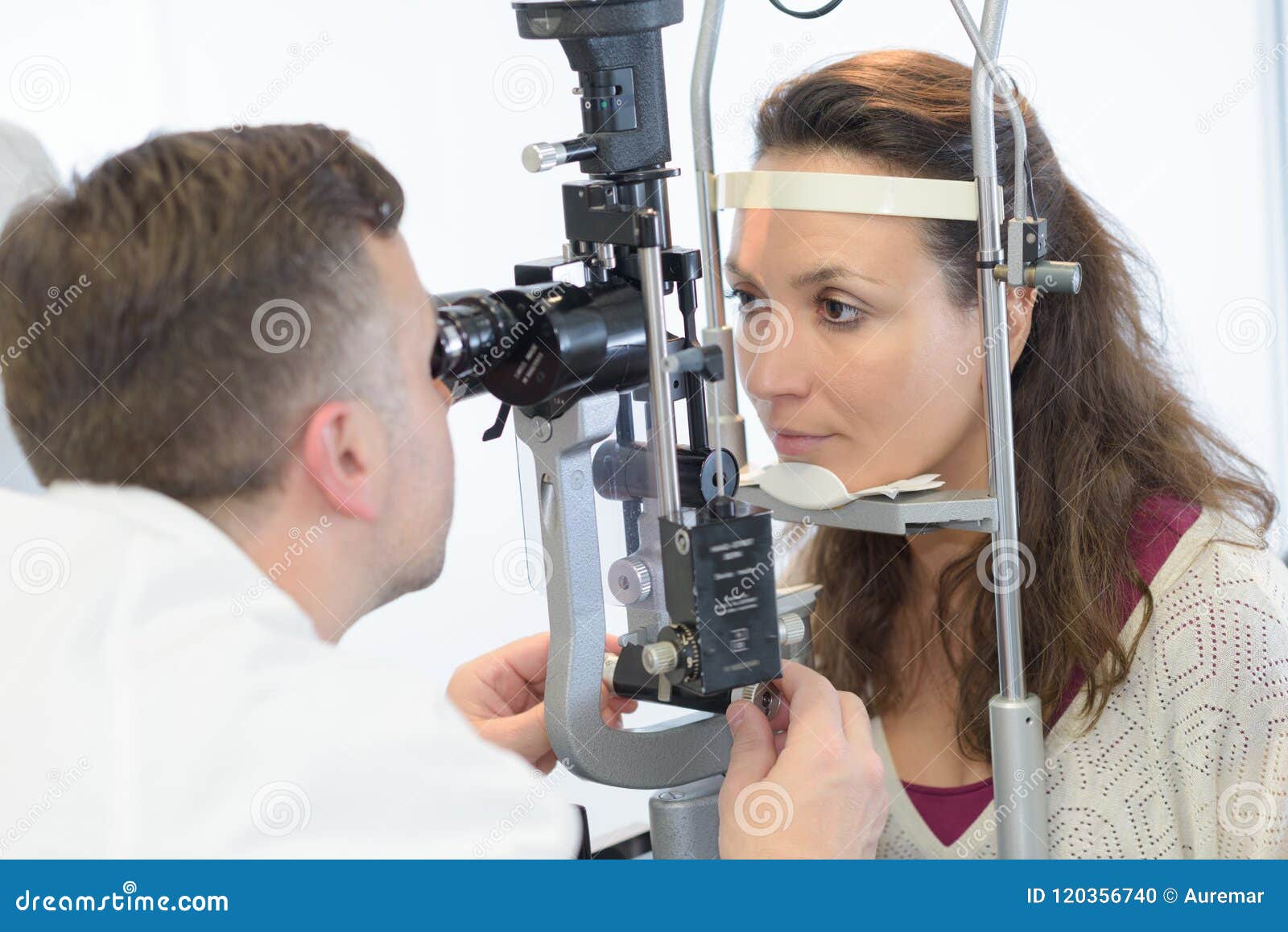 Optician Testing Female Patient Stock Photo - Image of examination ...