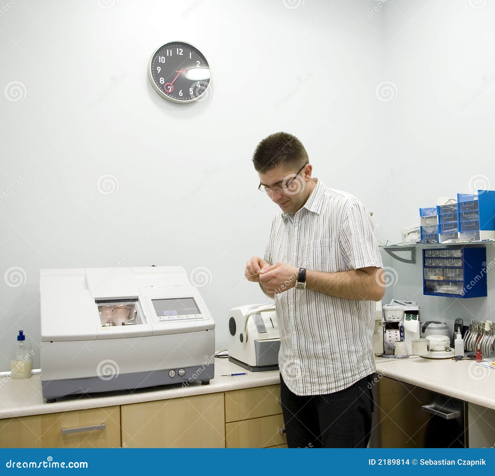 Optician at work. stock photo. Image of modern, office - 2189814