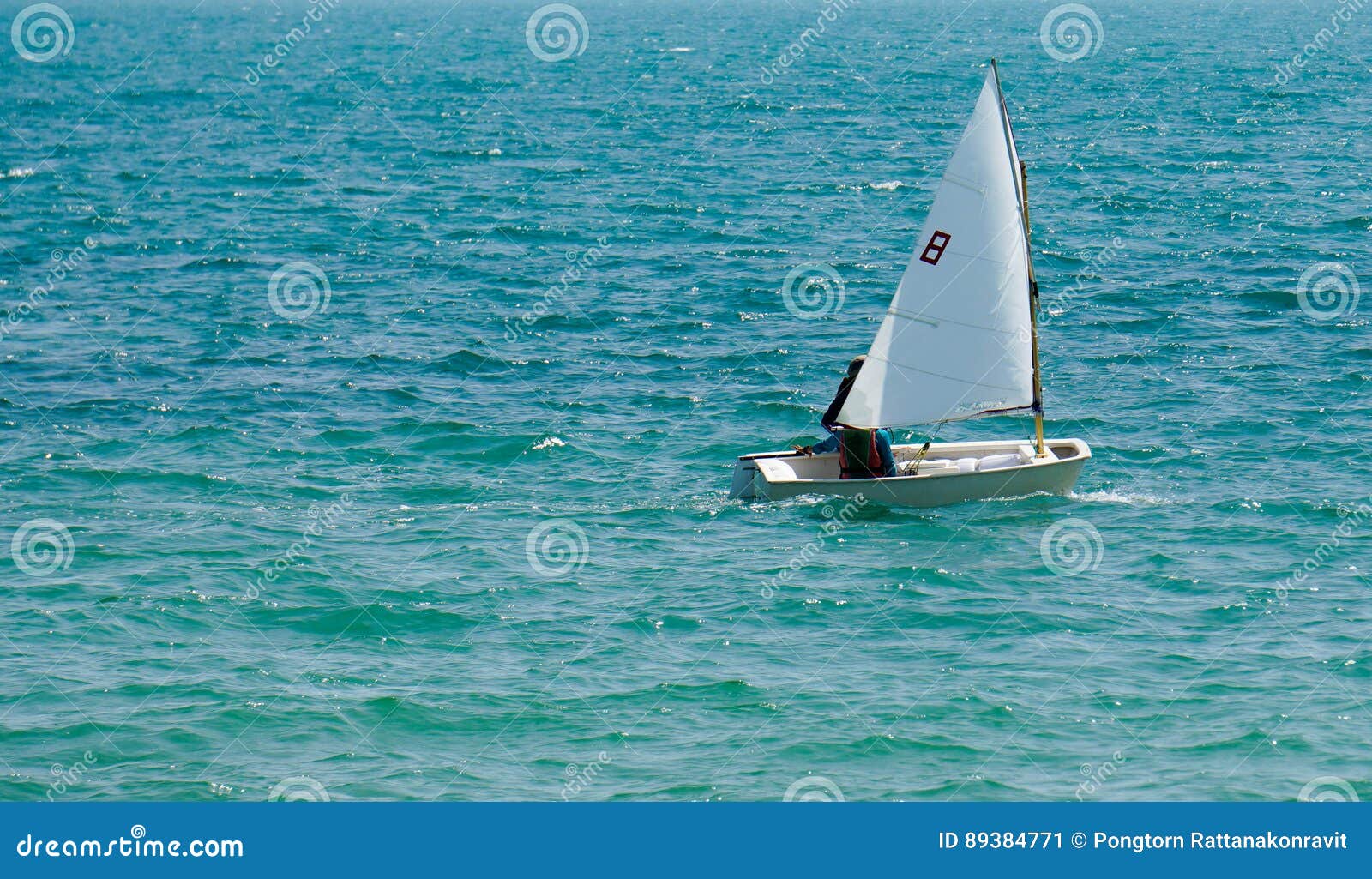Optimist sailing stock image. Image of water, white, crew - 89384771