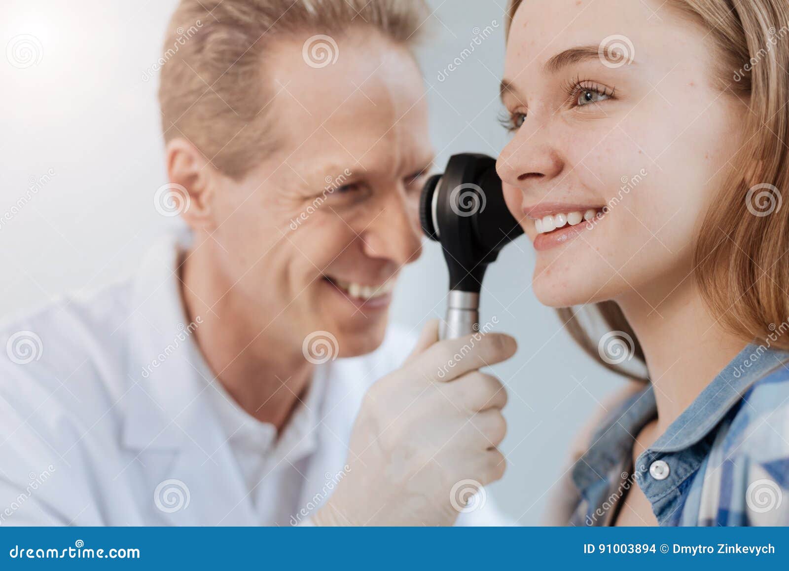 Optimistic Dermatologist Using Dermatoscope at Work Stock Photo - Image ...