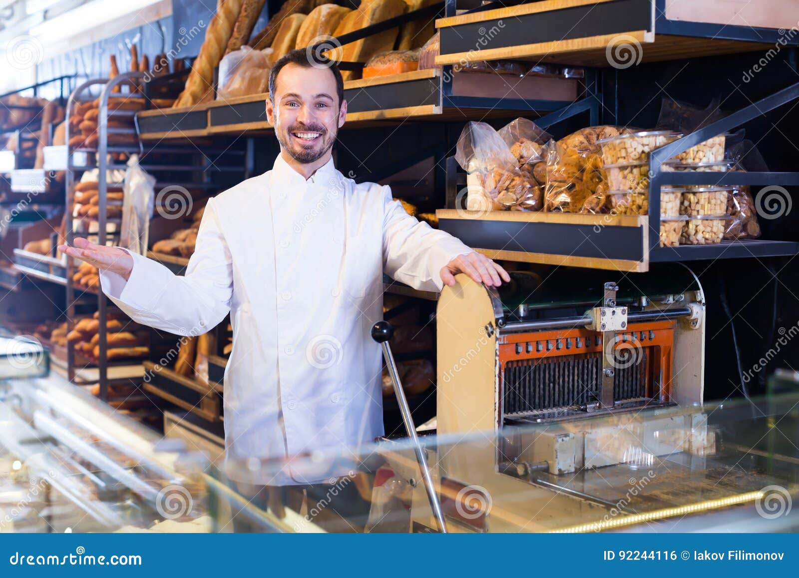Optimistic Male Pastry Maker Demonstrating Pastry Stock Photo - Image ...