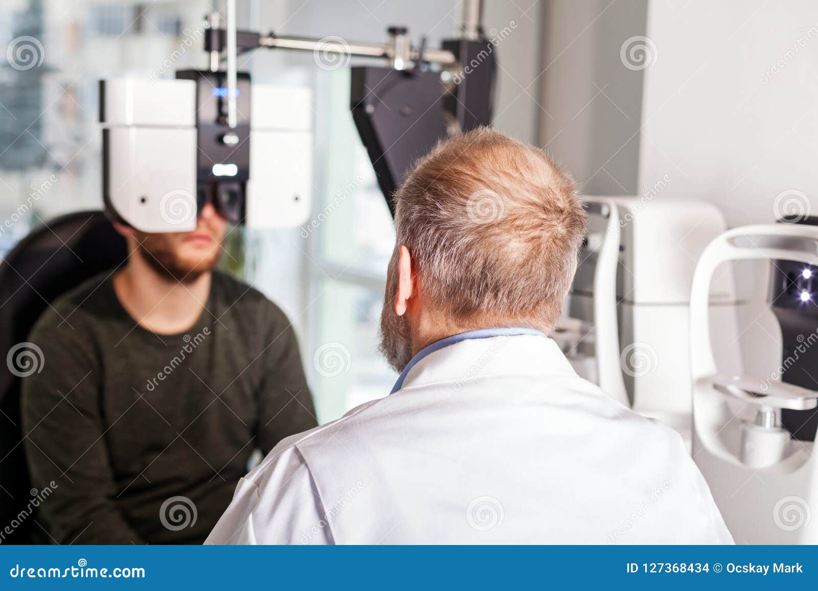 Optometric exam stock photo. Image of oculist, check - 127368434