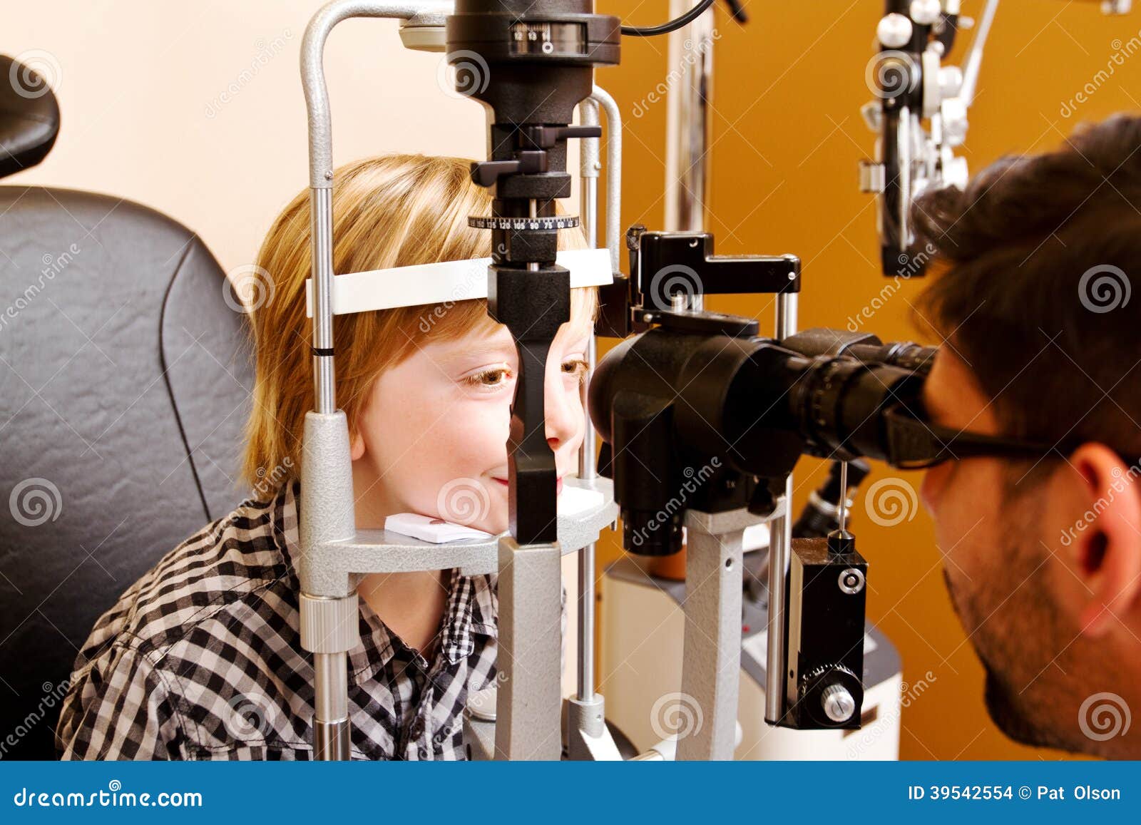Optometrist Checking Childs Vision Stock Photo - Image of exam ...