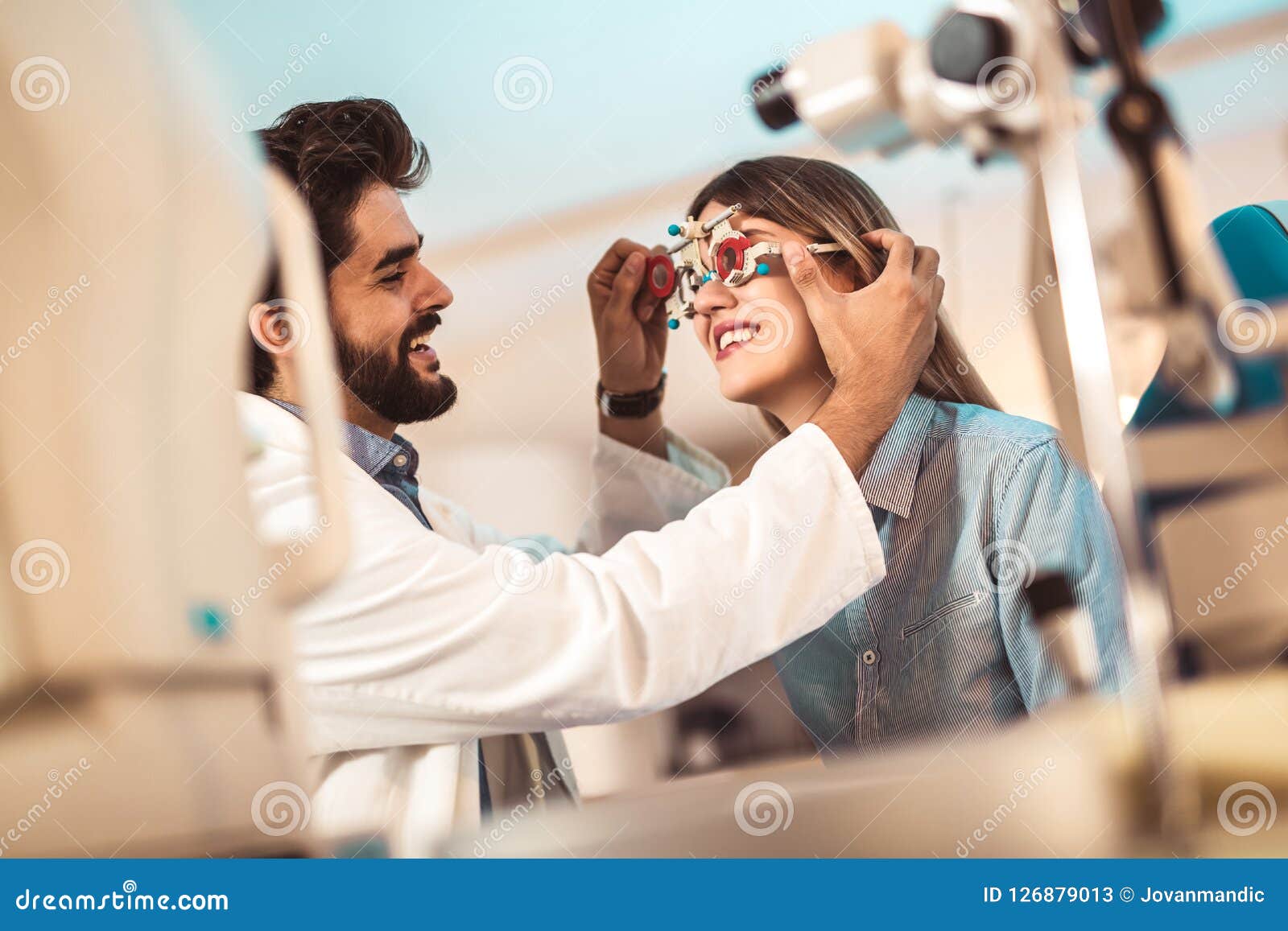 Optometrist Checking Patient Eyesight and Vision Correction Stock Image ...