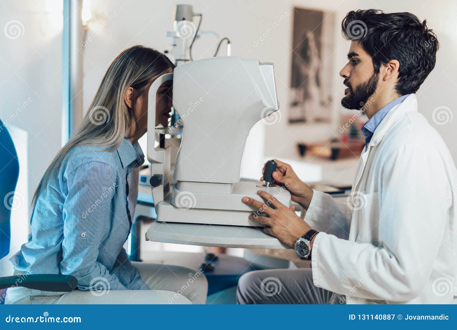 Optometrist Checking Patient Eyesight and Vision Correction Stock Image ...