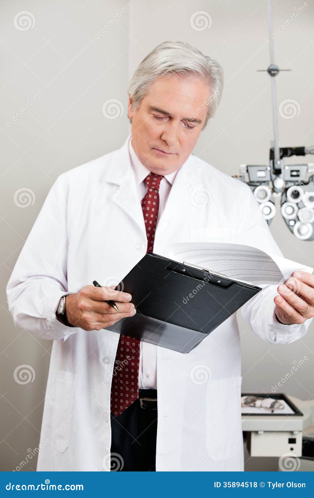 Optometrist Checking the Prescription Stock Photo - Image of optician ...