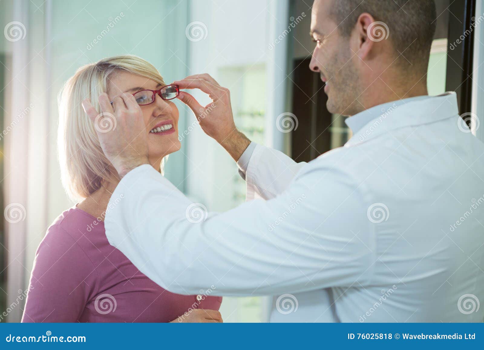 Optometrist Consulting a Customer about Spectacles and Frames Stock ...