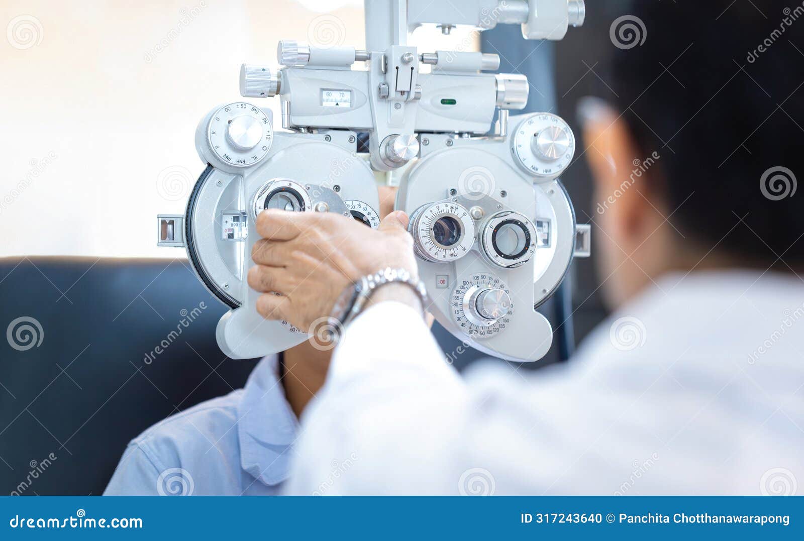 Optometrist Doing Sight Testing for Child Patient in Clinic, Kid Boy ...
