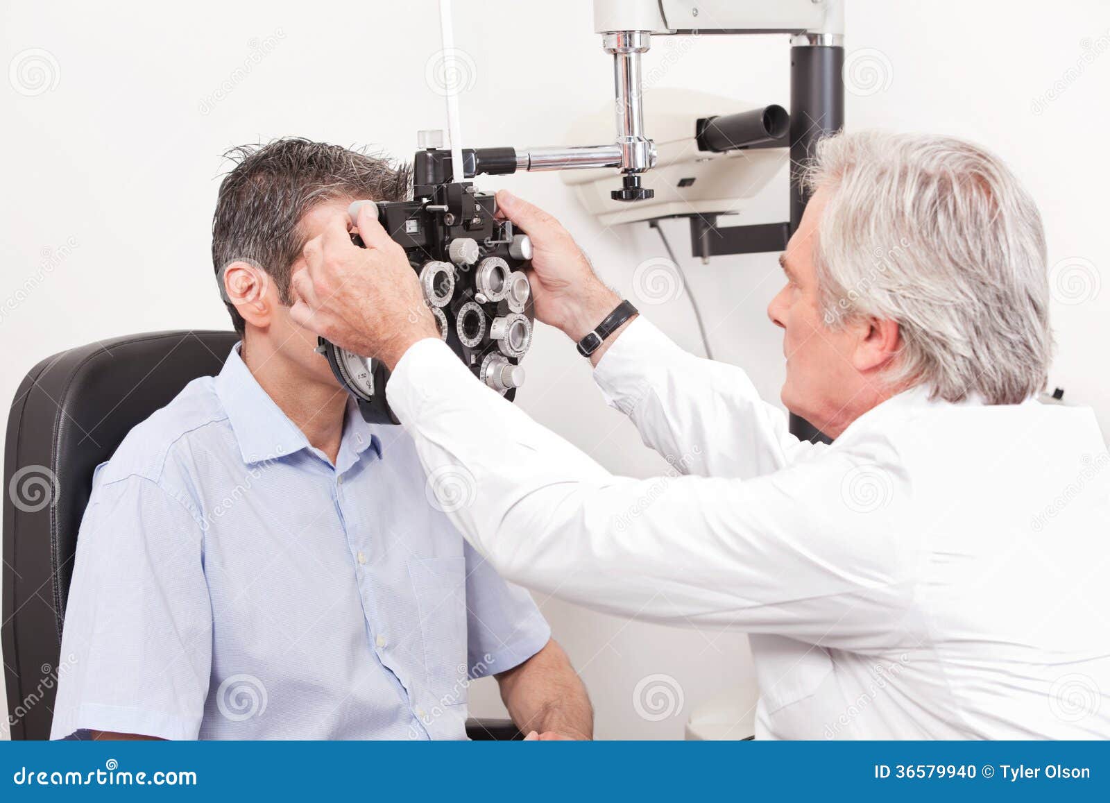 Optometrist Doing Sight Testing Stock Photo - Image of look, equipment ...