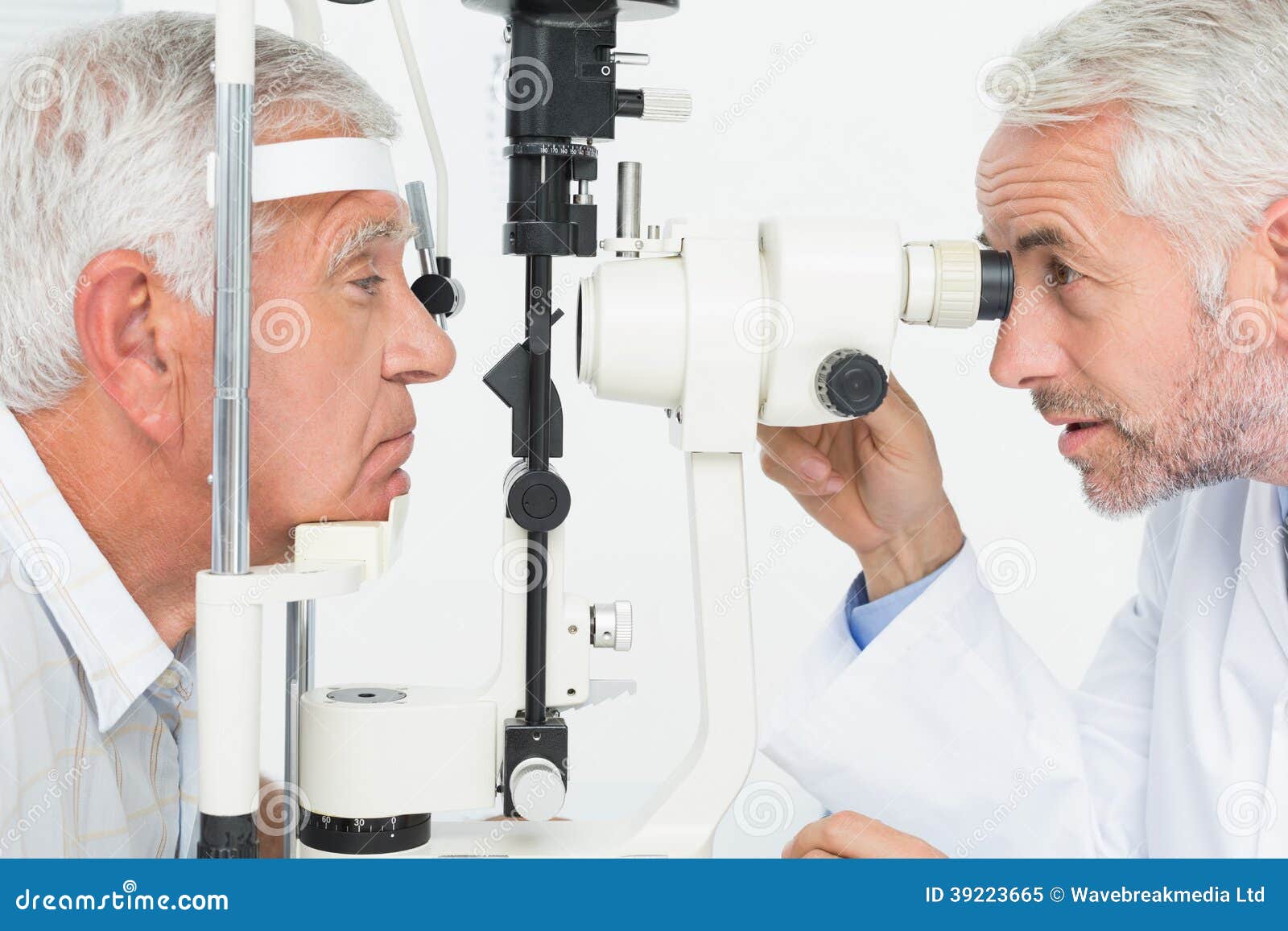 Optometrist Doing Sight Testing for Senior Patient Stock Image - Image ...