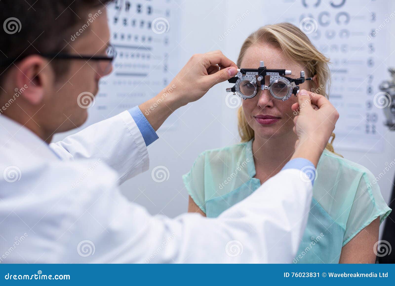 Optometrist Examining Female Patient with Phoropter Stock Image - Image ... Optometrist Examining Female Patient with Phoropter Stock Image - Image ...