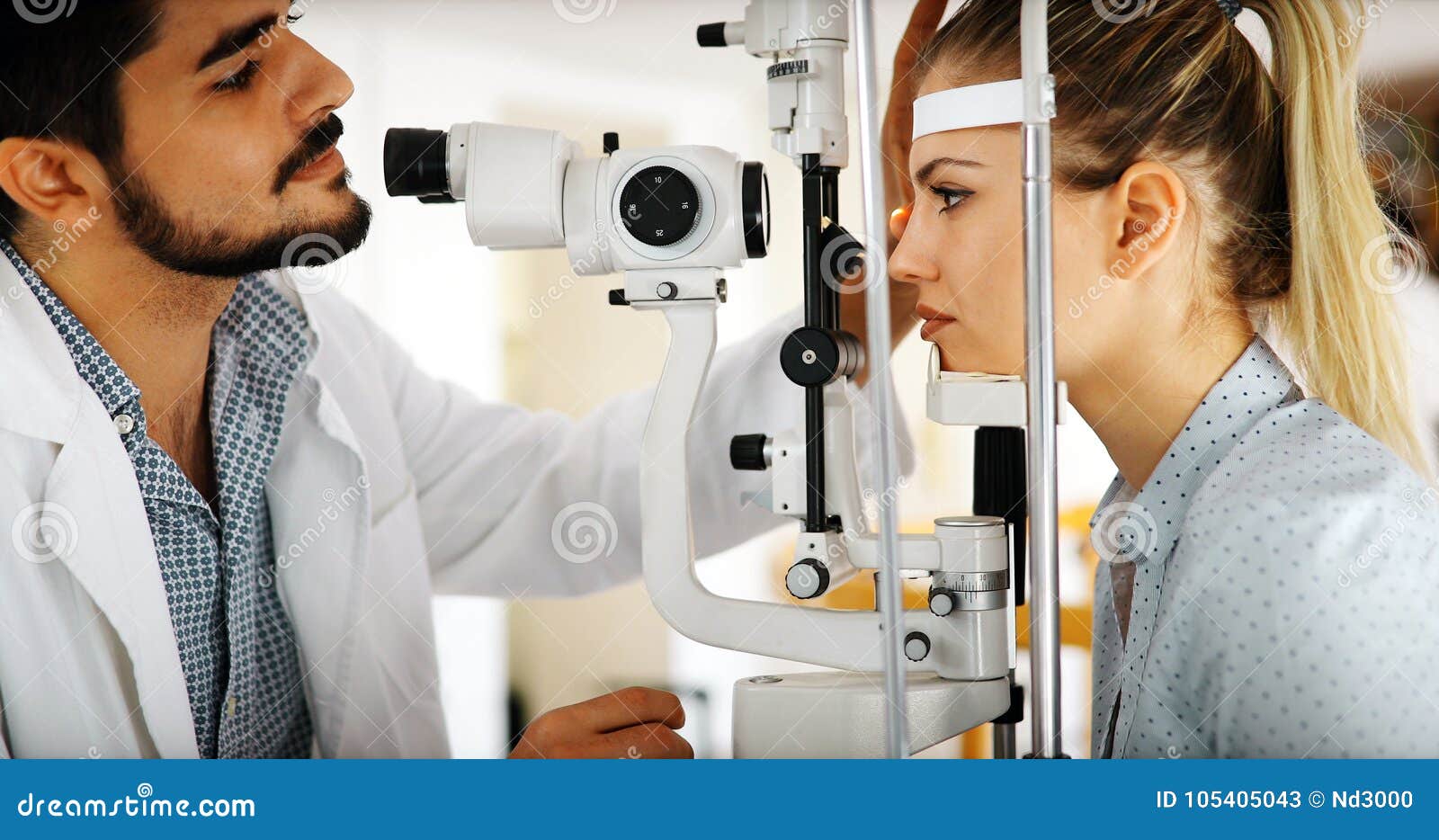 Optometrist Examining Patient in Modern Ophthalmology Clinic Stock ... Optometrist Examining Patient in Modern Ophthalmology Clinic Stock ...