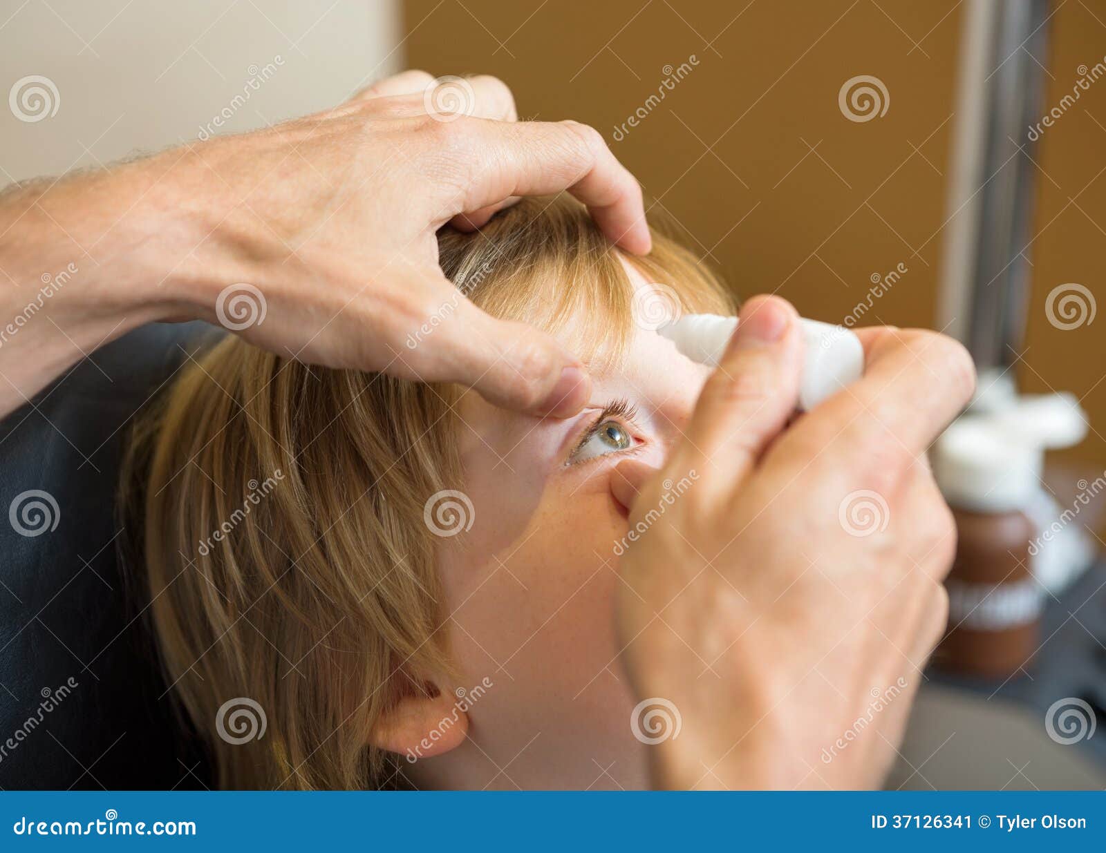 Optometrist Hands Putting Eye Drops in Patients Stock Image - Image of ...