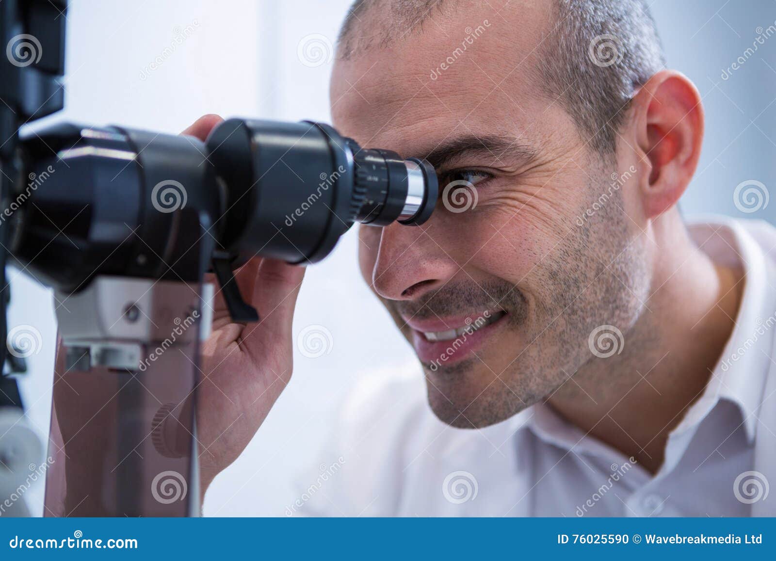 Optometrist Looking through Biomicroscope Stock Photo - Image of ...