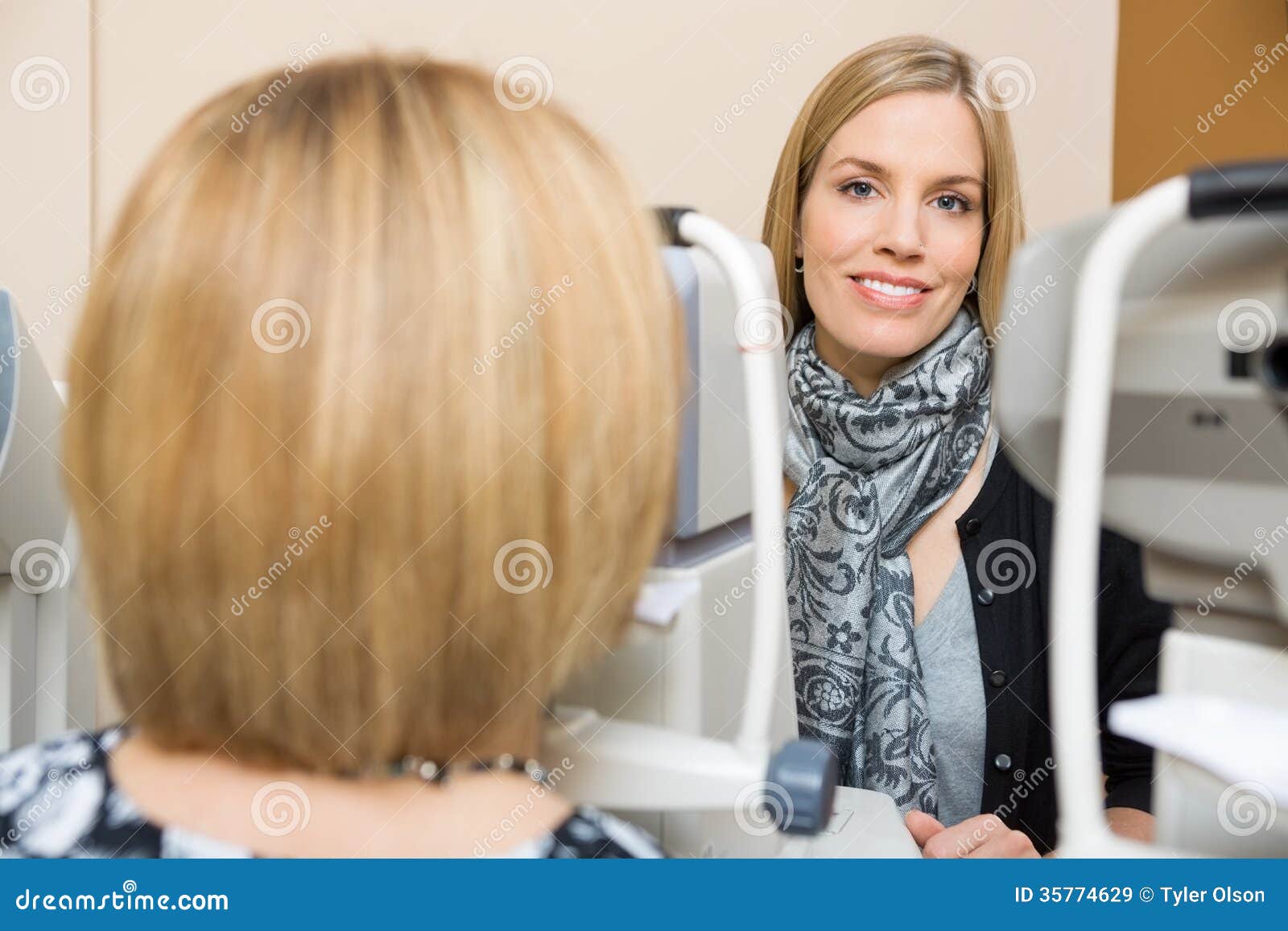 Optometrist Using Tonometer To Measure Patients Stock Image - Image of ...
