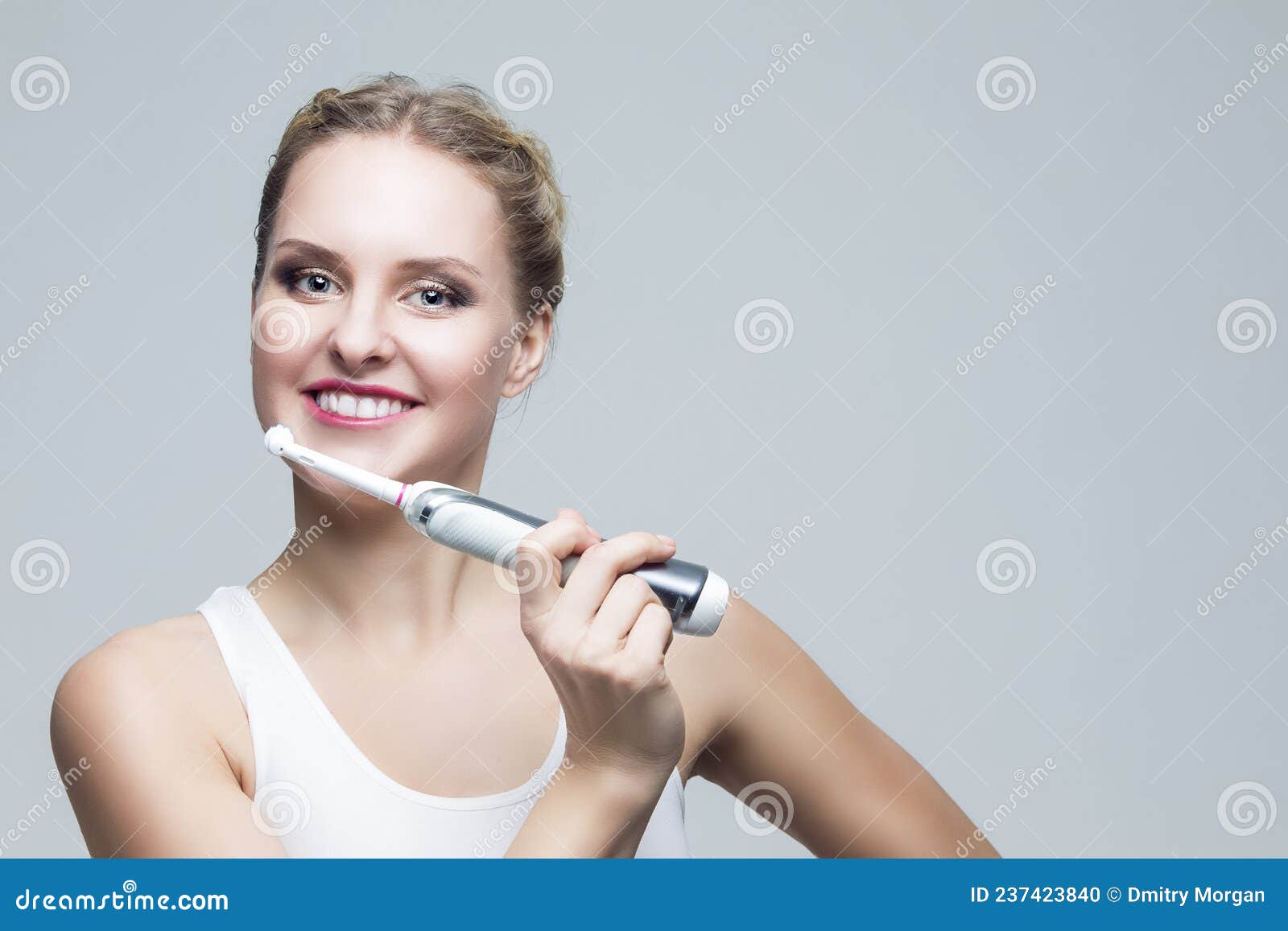 Oralcare And Dentistry Concepts Caucasian Blond Woman Cleaning Teeth