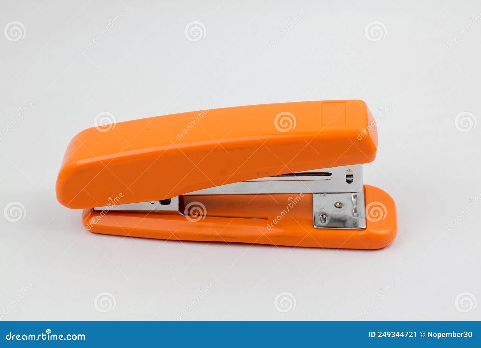 Orang big stapler stock image. Image of paperwork, joins - 249344721