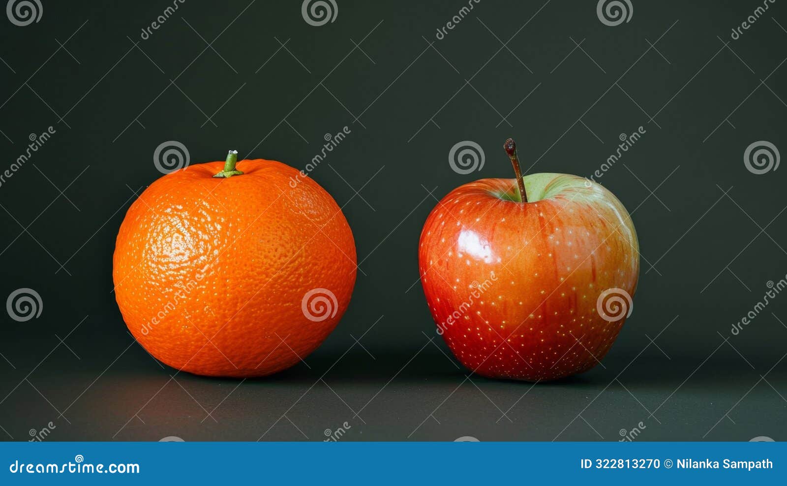 Orange and Apple on a Grey Background. Apple Vs Orange Comparison Stock ...