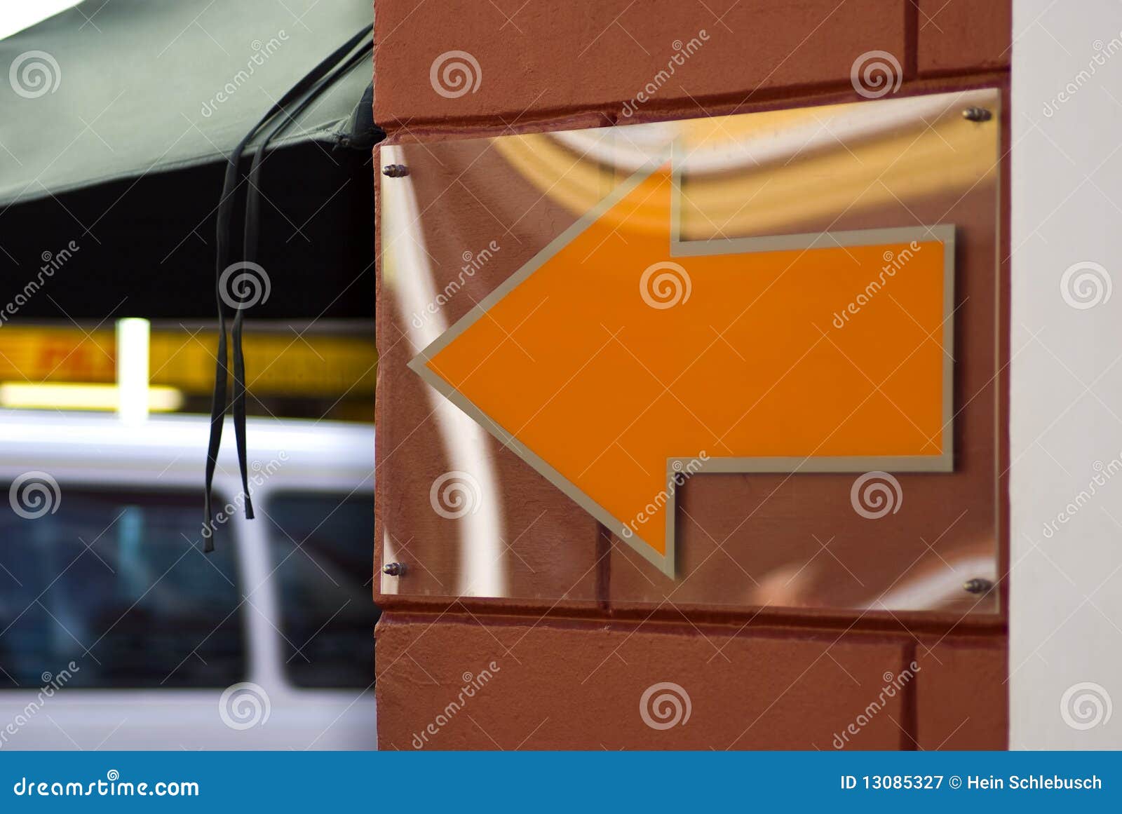 Orange arrow sign stock image. Image of color, building - 13085327