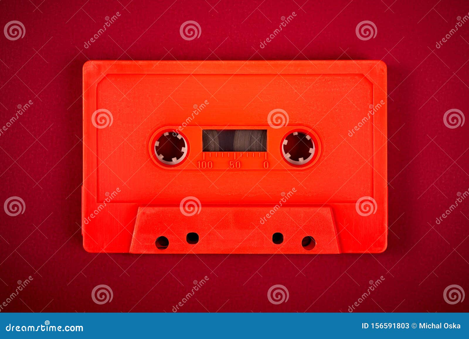 Orange Audio Cassette on the Dark Red Background Stock Image - Image of ...