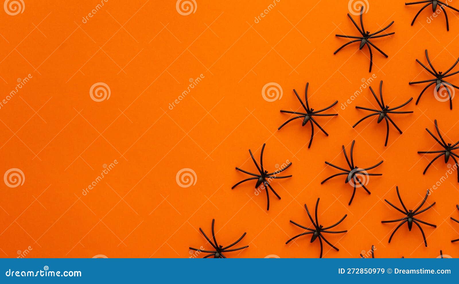 Orange Background Decoration for Halloween with a Group of Spiders ...
