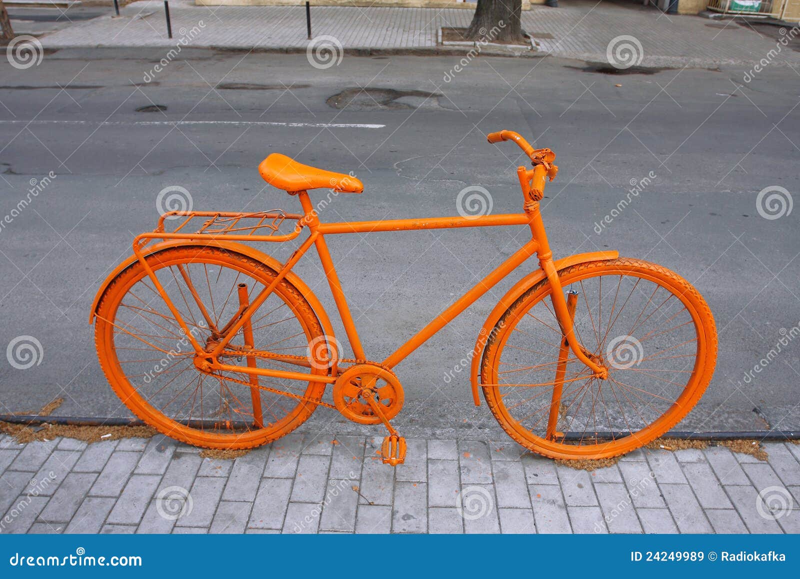 Orange Bicycle on the Street Stock Image - Image of retro, pedal: 24249989