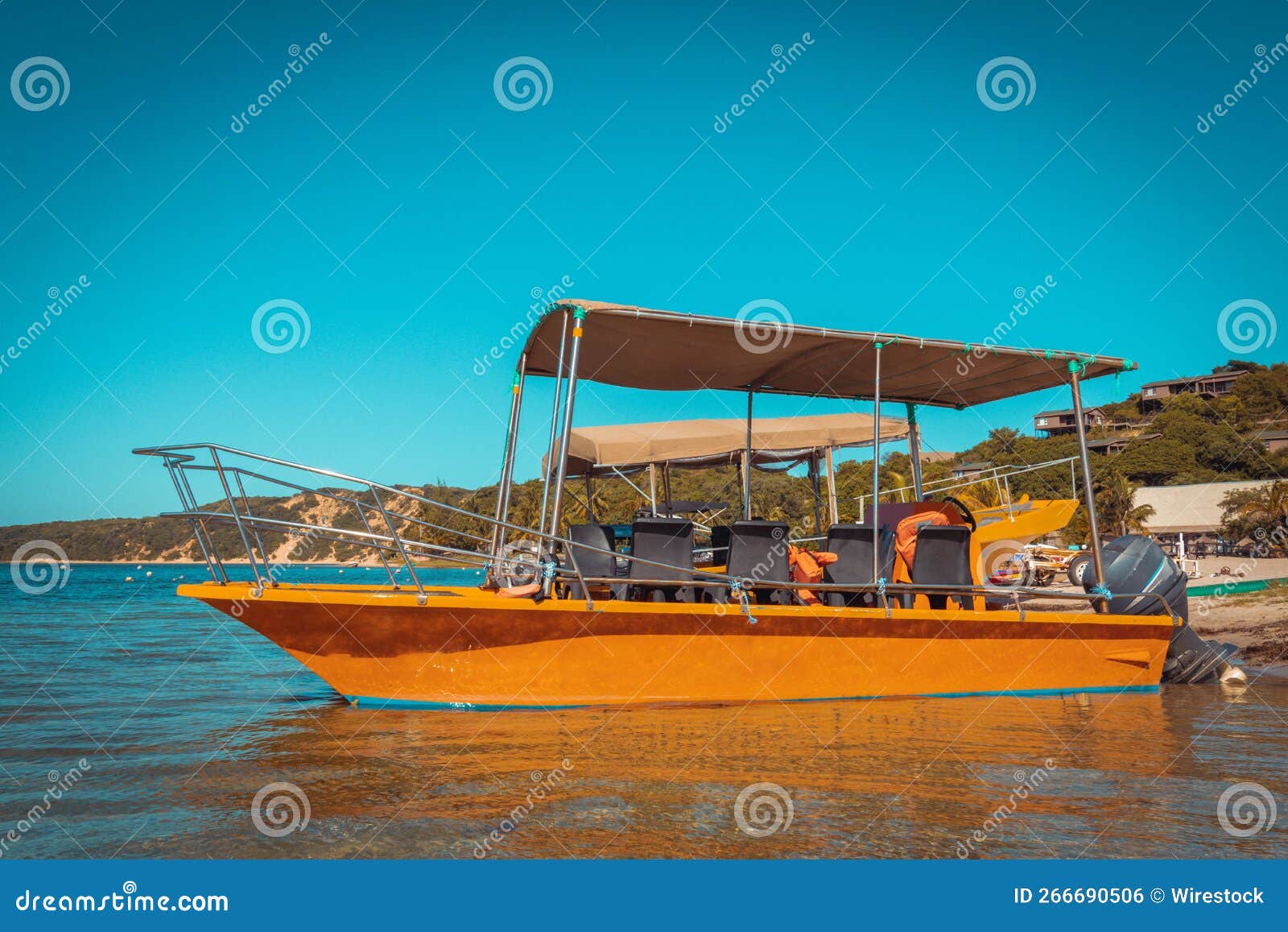 Orange boat on the sea stock photo. Image of boat, outdoor - 266690506