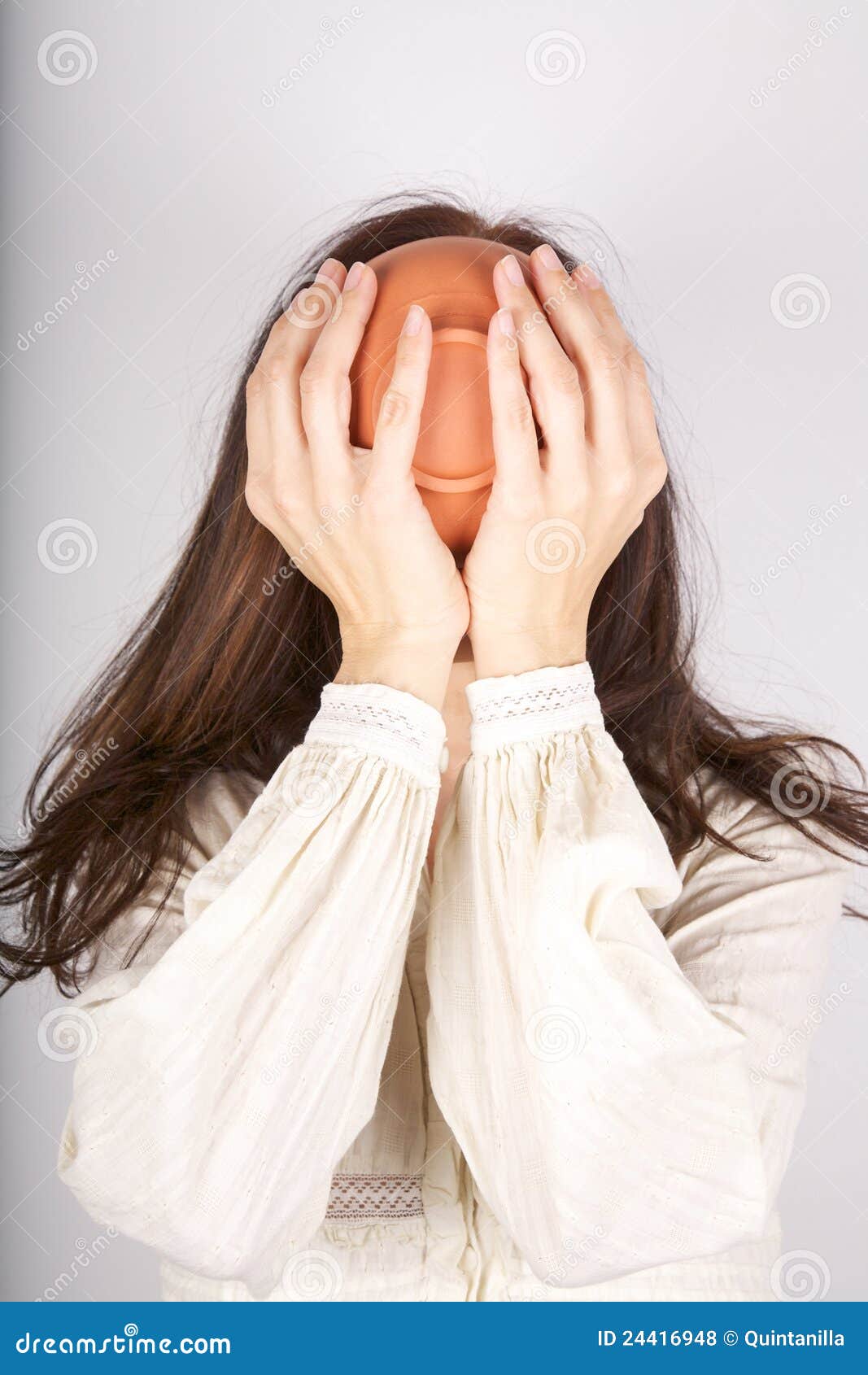 Orange bowl on face stock photo. Image of adult, face - 24416948