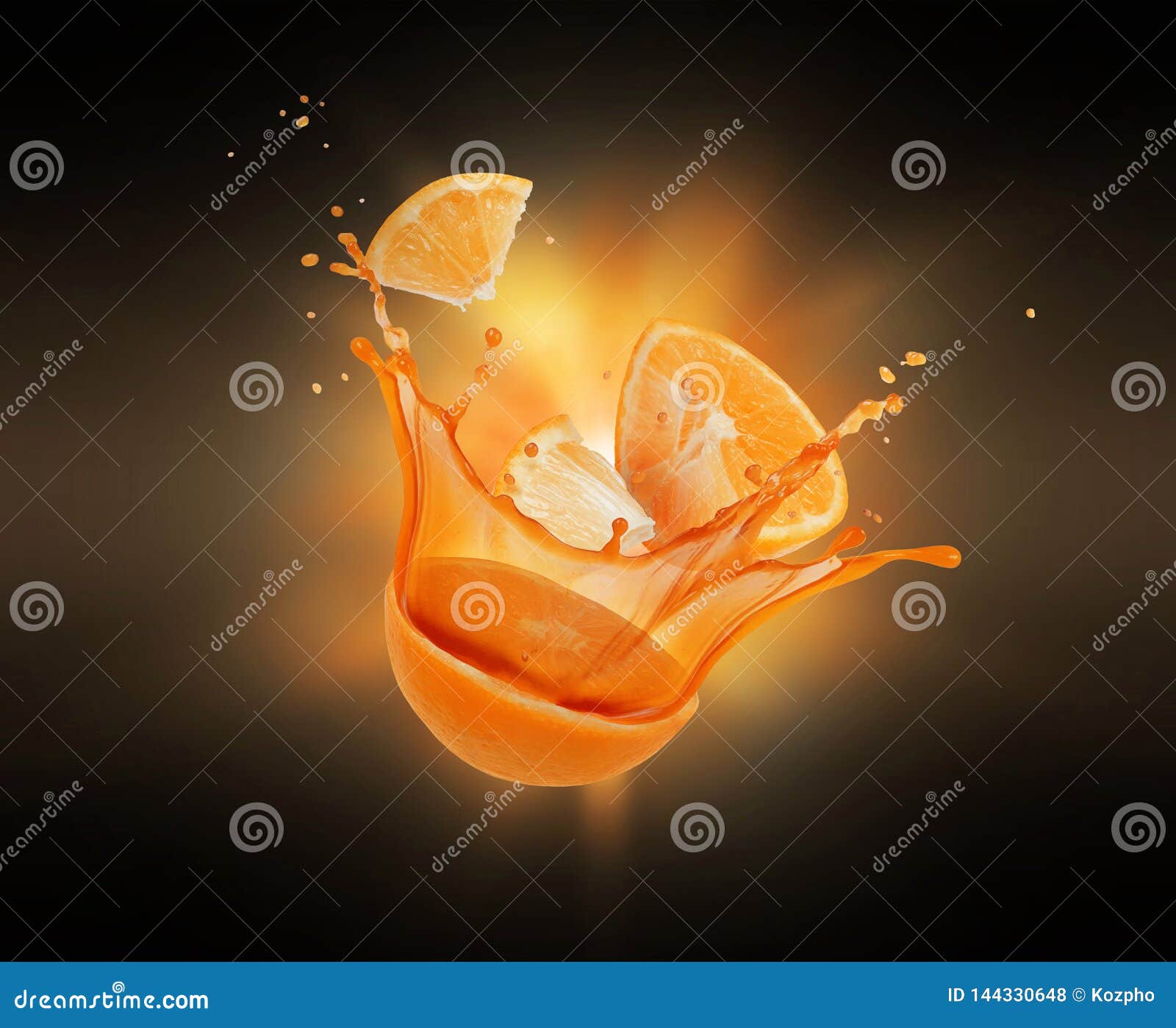 Orange Broken into Pieces with Splashes of Juice in the Dark Stock ...