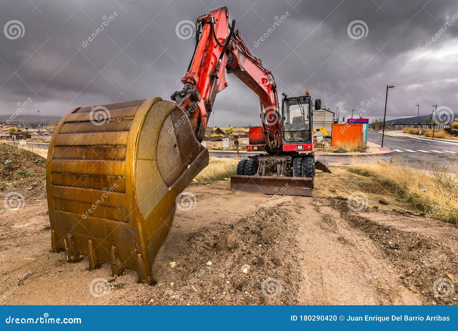 An Orange Bulldozer at a Construction Site Stock Photo - Image of build ...