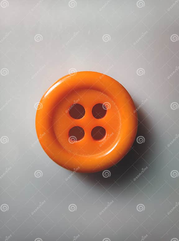 Orange Button Isolated on White Background Stock Image - Image of tailor, button: 266047131