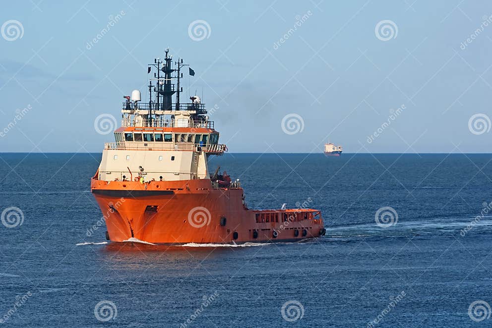 Orange Cargo Ship stock image. Image of supply, work - 18935415
