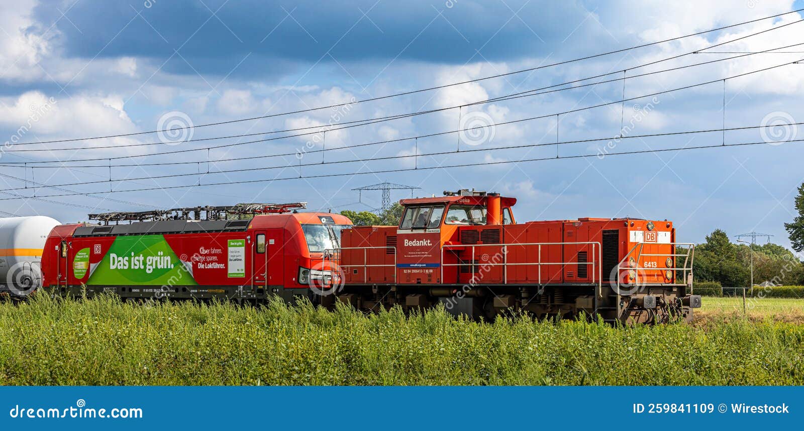 Orange Cargo Train Riding Near the Rice Plantation Editorial Stock ...
