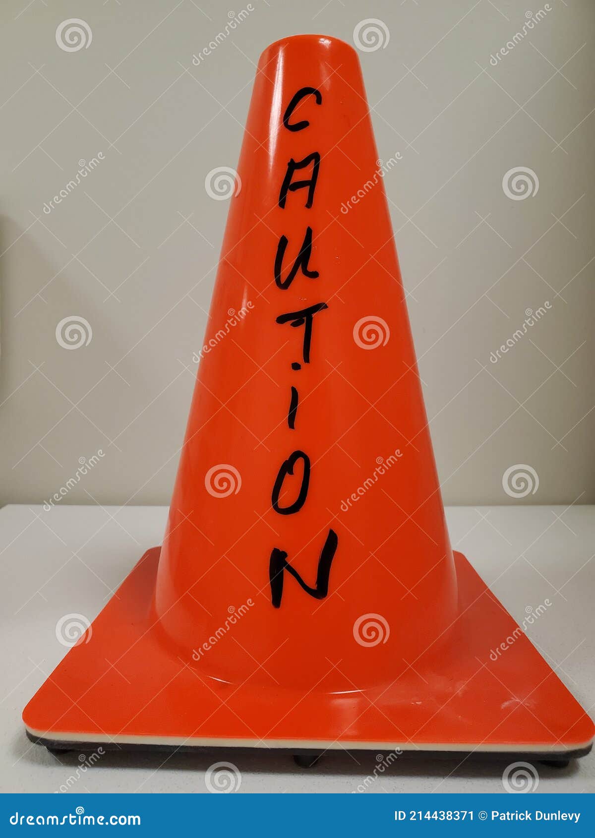 Orange caution cone stock image. Image of safety, help - 214438371
