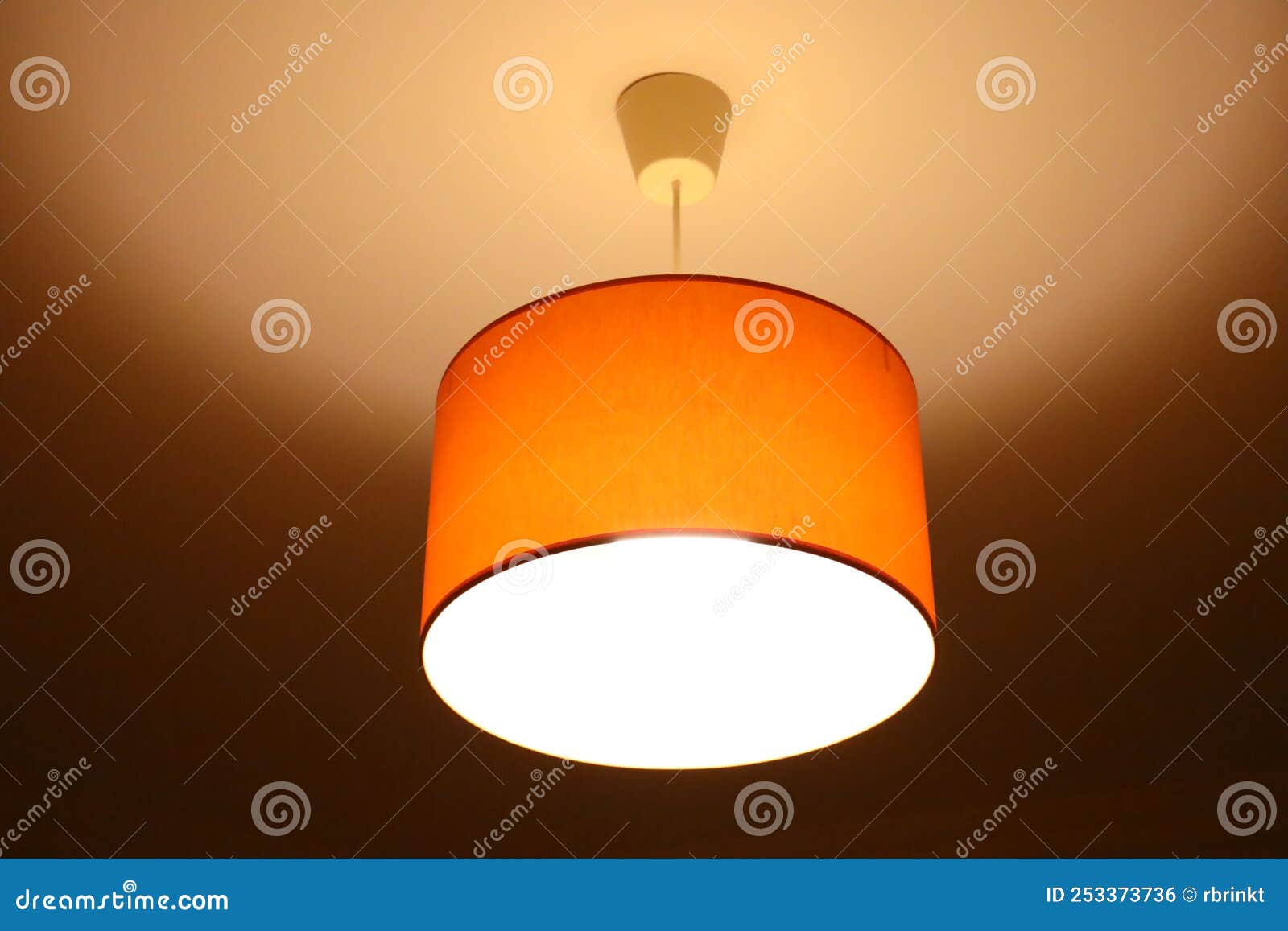 Orange ceiling lamp stock photo. Image of lighting, ornage - 253373736
